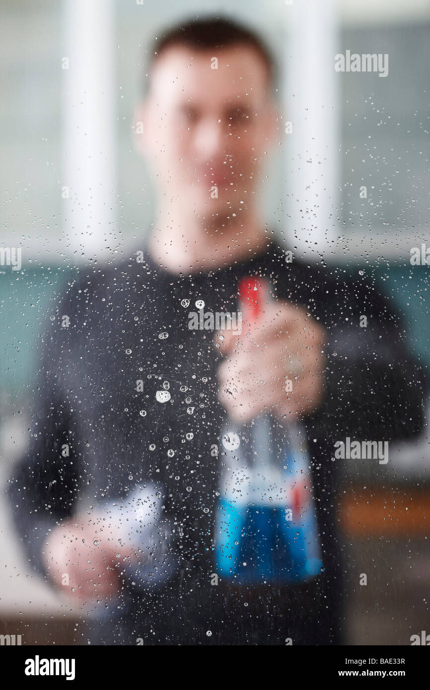 Man Cleaning Glass Stock Photo - Alamy
