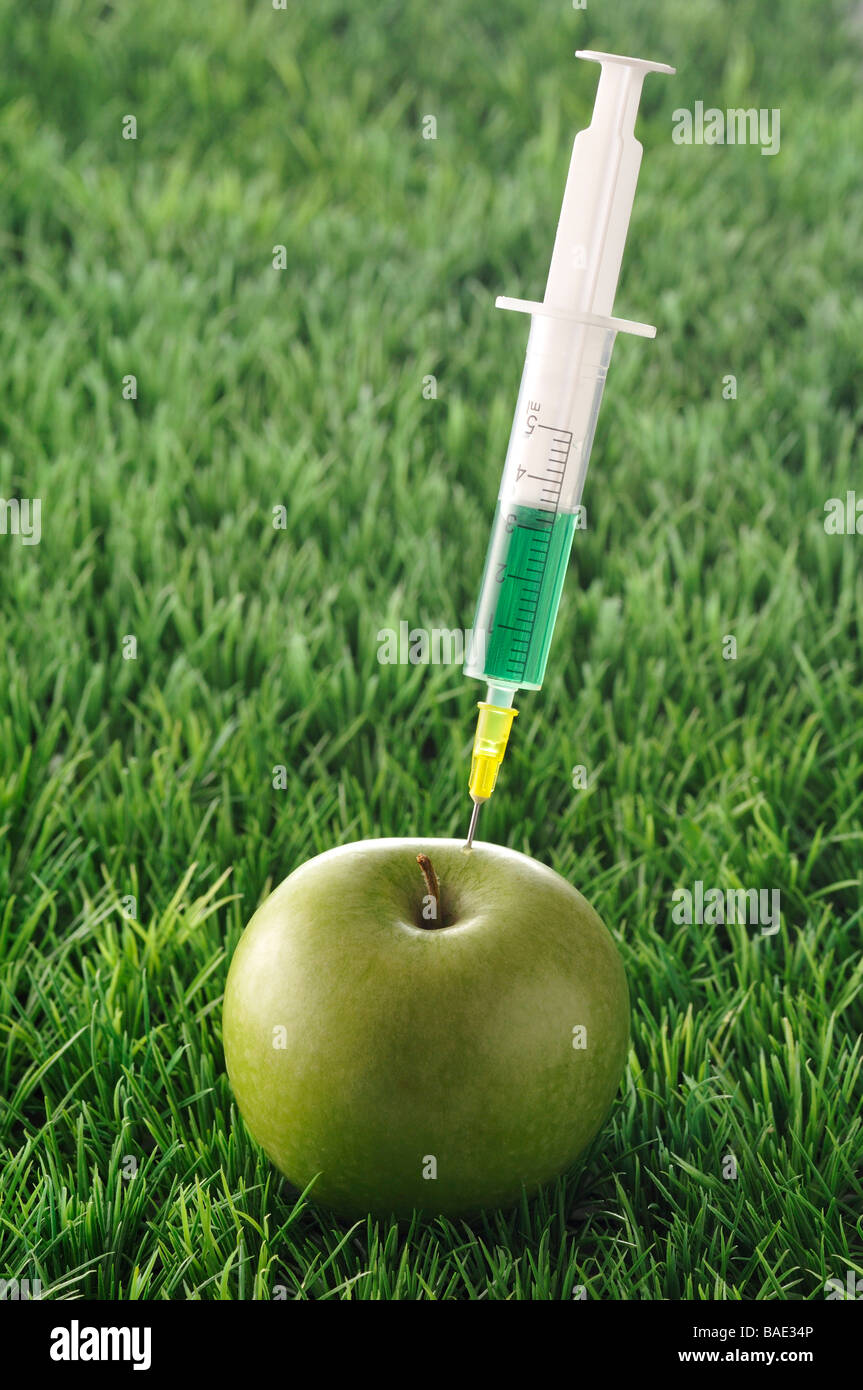 Apple being Injected Stock Photo - Alamy