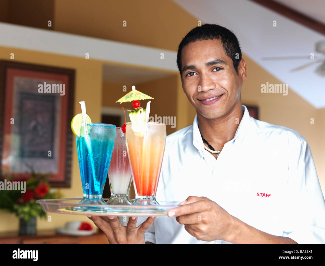 Waiter Serving Drinks, Costa Maya Resort, Belize Stock Photo - Alamy