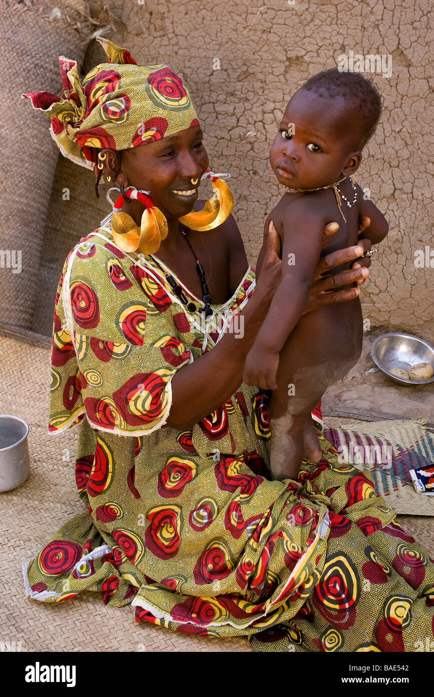 Mali, Niger River banks, Fula woman with tatooed mouth and golden ...