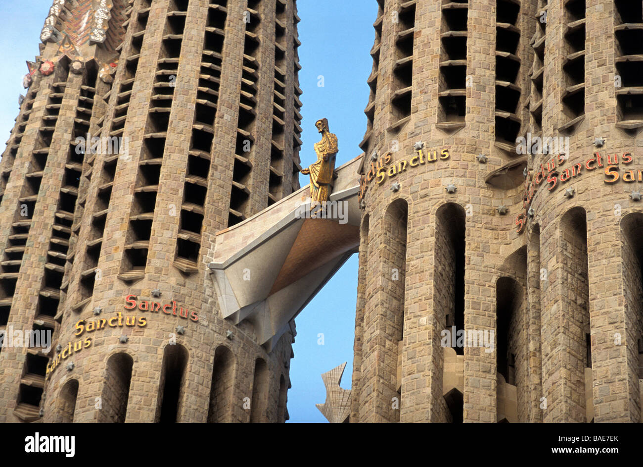 Risen Christ as a gold figure, Passion facade of the Sagrada Familia, Barcelona, Catalonia ...