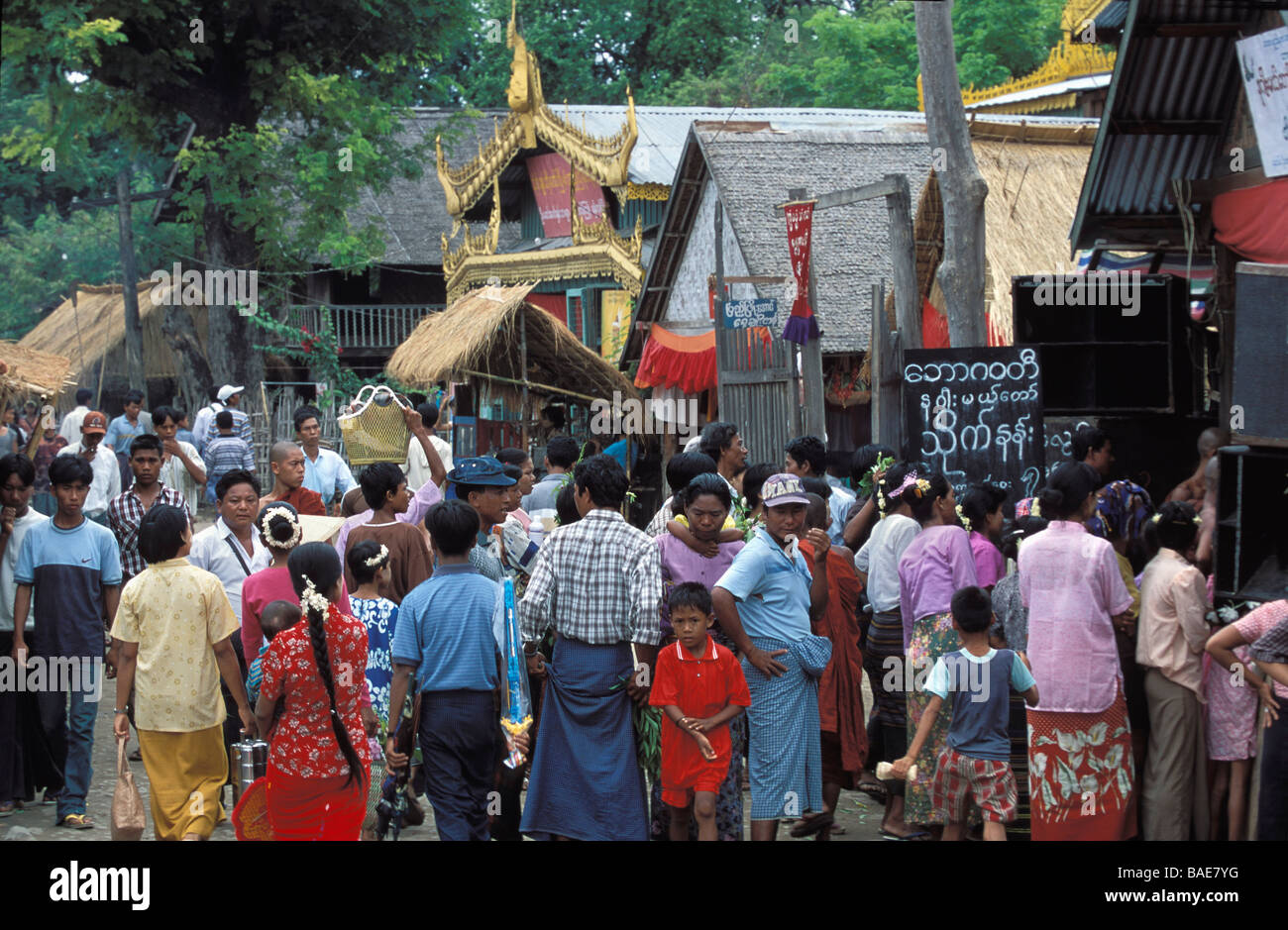 Myanmar (Burma), Sagaing Division, Taungbyon, crowd in the street ...