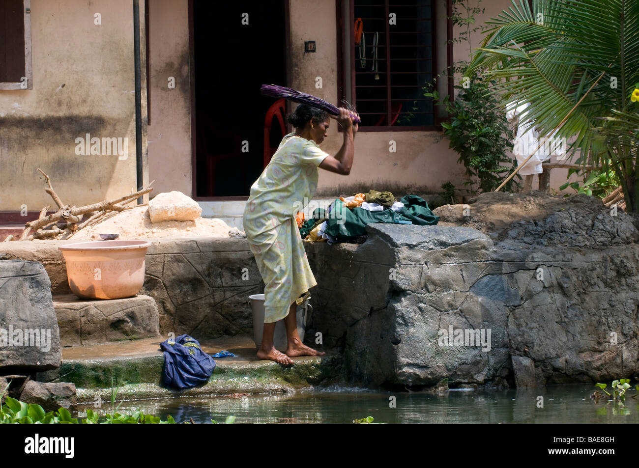 Women Washing Clothes In River Stock Photos & Women Washing Clothes In ...