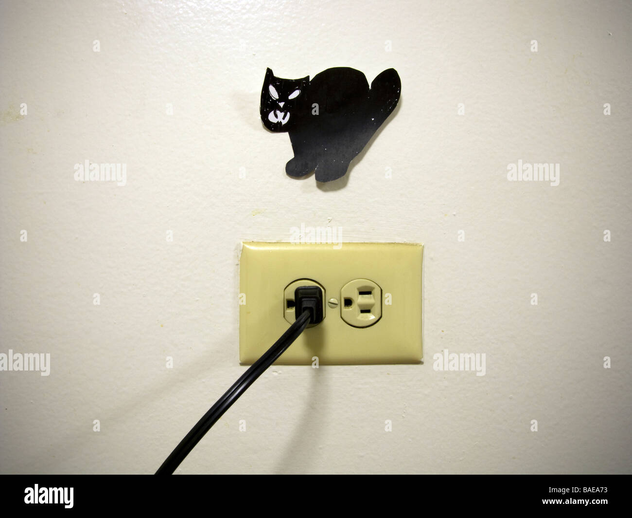 An electrical outlet with a wall decoration in New York on Tuesday ...