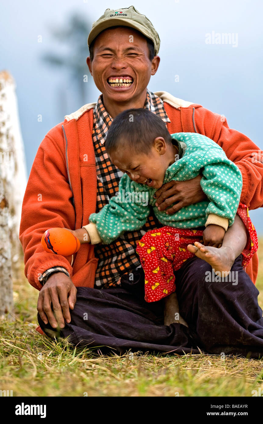 Myanmar (Burma), Sagaing Division, Leshi village, Sweipoh with one of her four children San Win ...