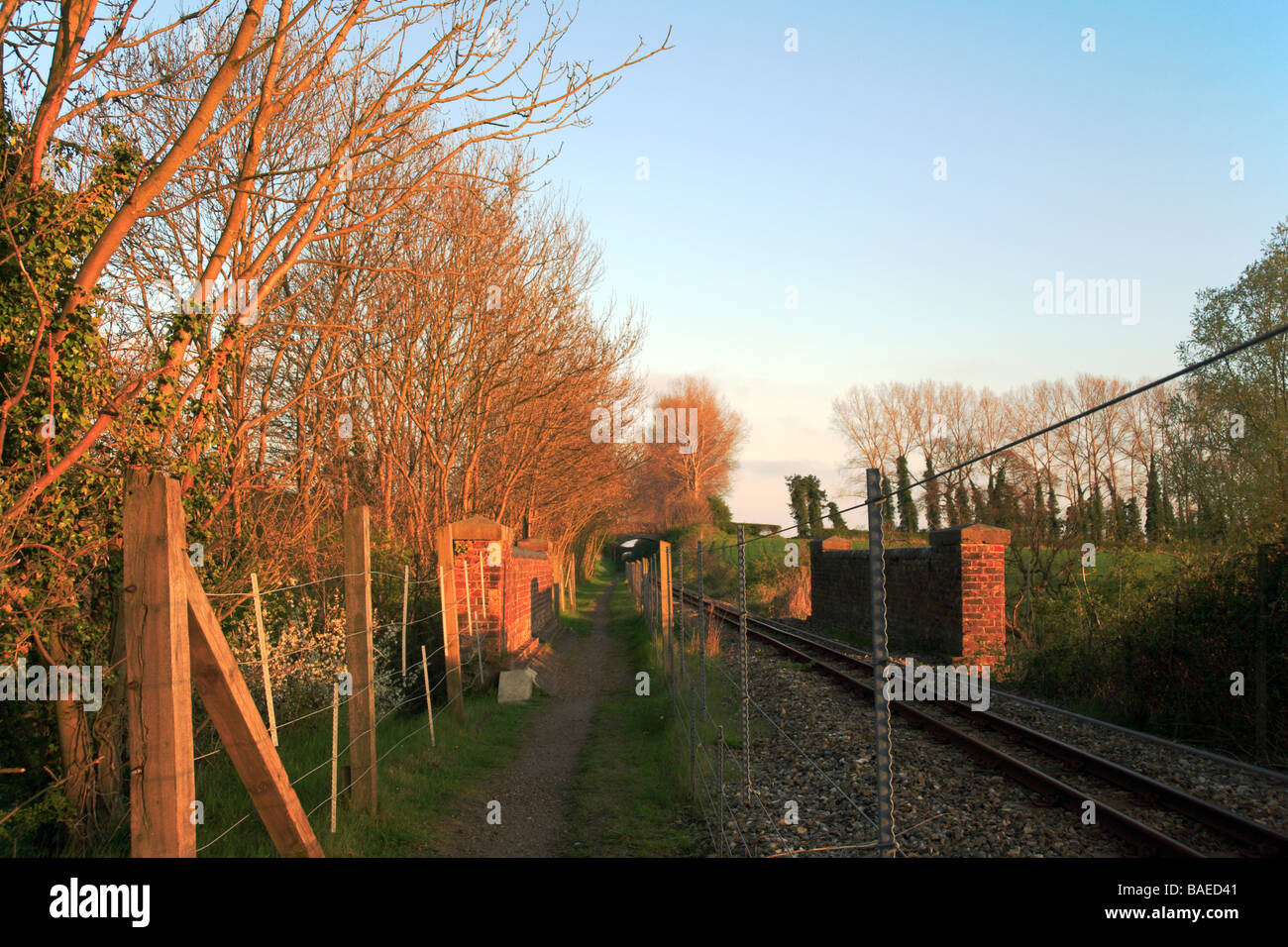 Bure Valley Railway and public walk passing over a bridge at Burgh-next ...