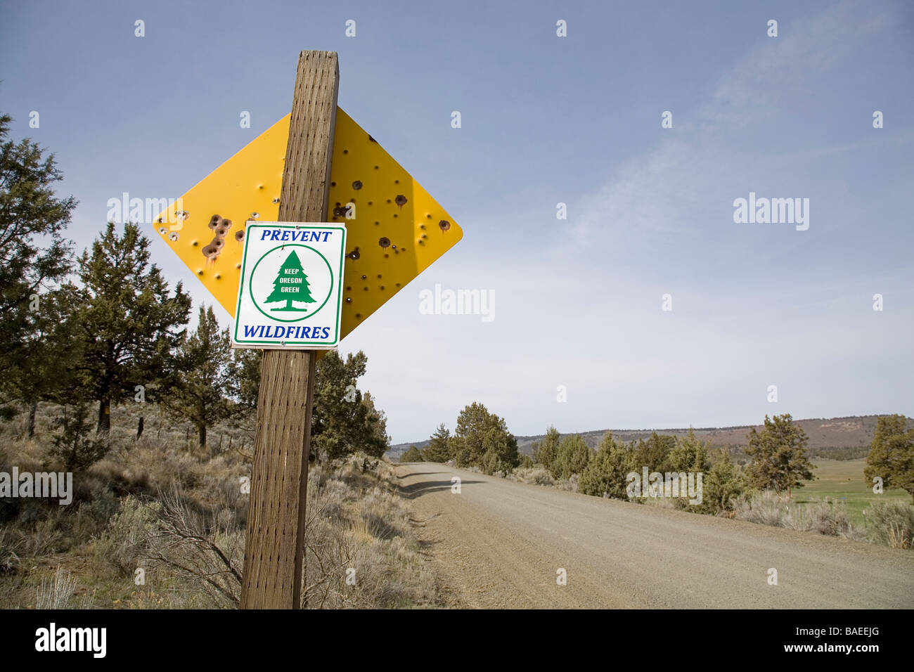 USA OREGON CROOKED RIVER VALLEY A Prevent Wildfires sign on a bullet ...