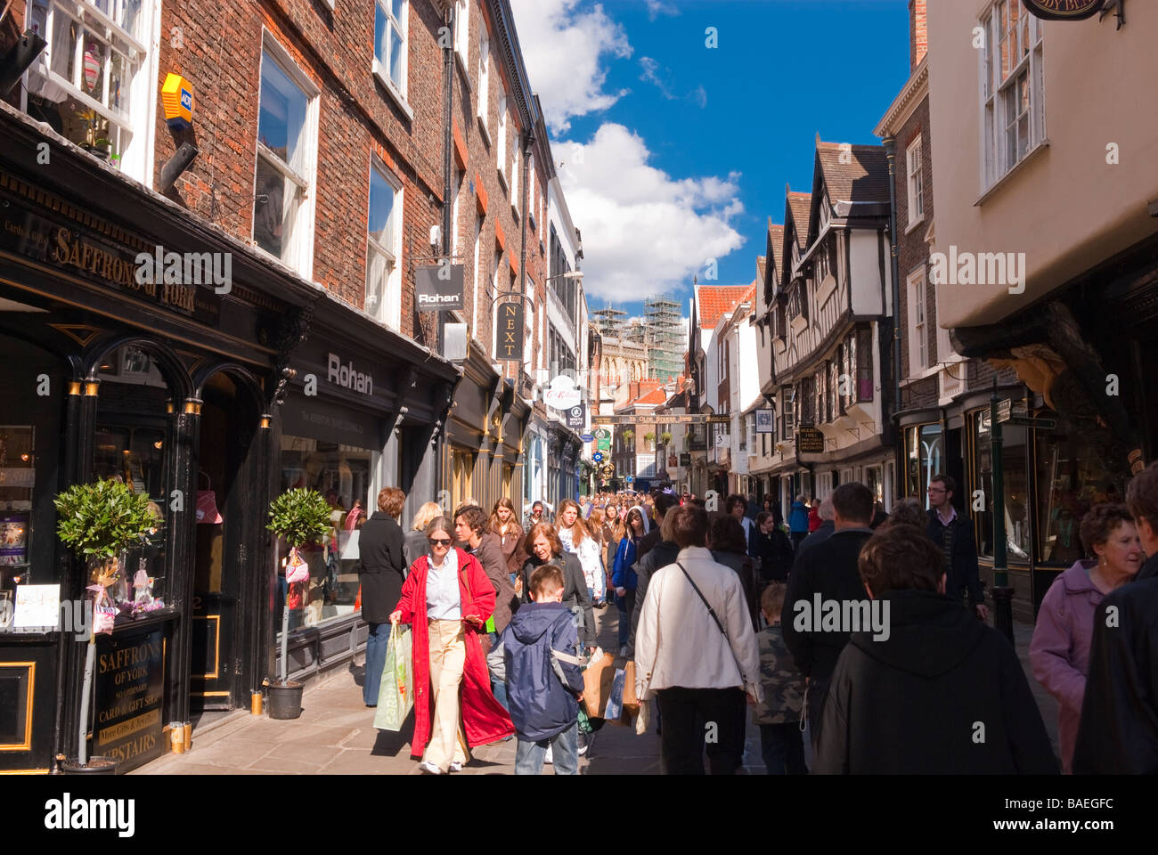Shoppers and tourists in the busy streets of York,Yorkshire,Uk Stock ...