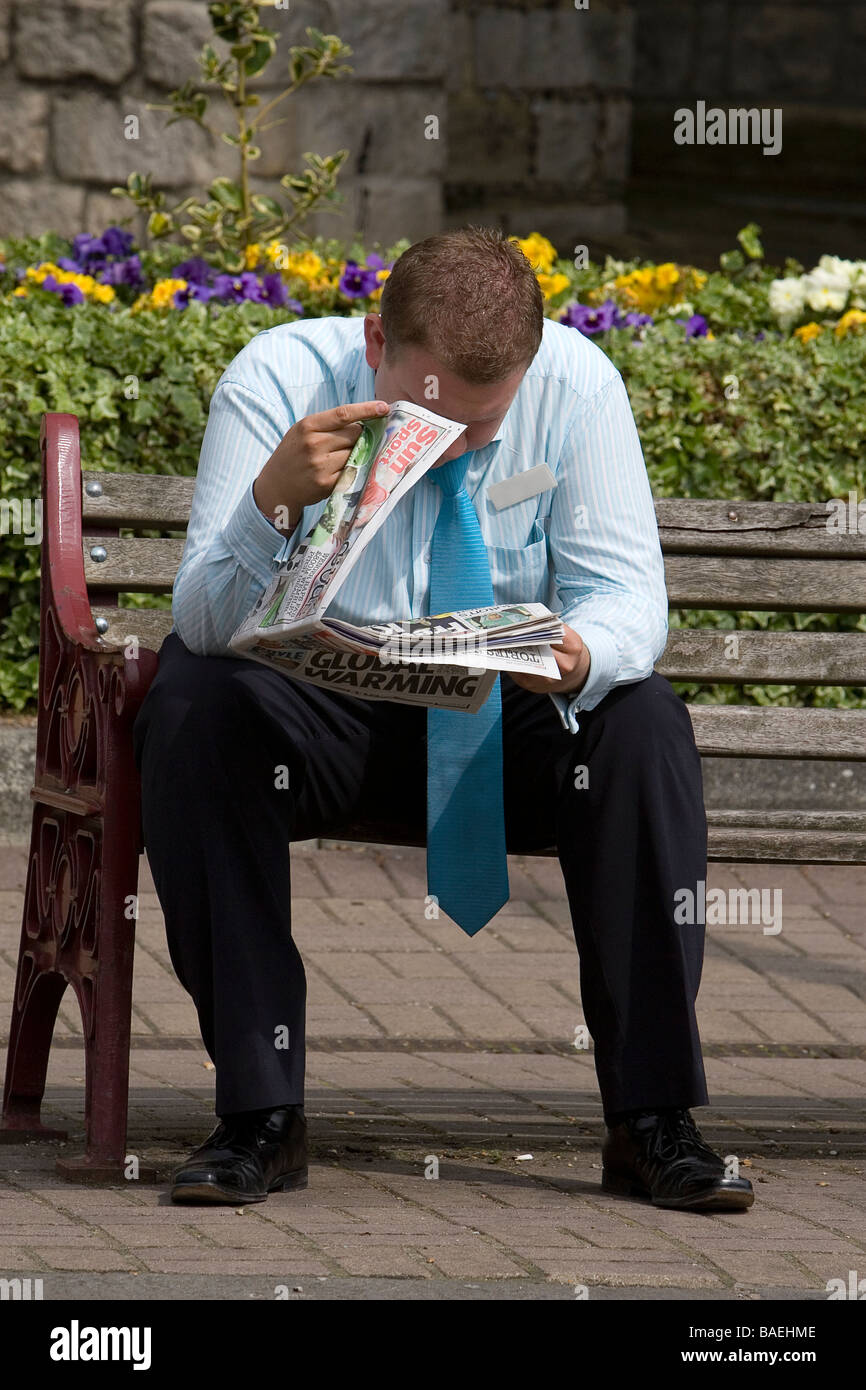 Man reading a newspaper Stock Photo - Alamy