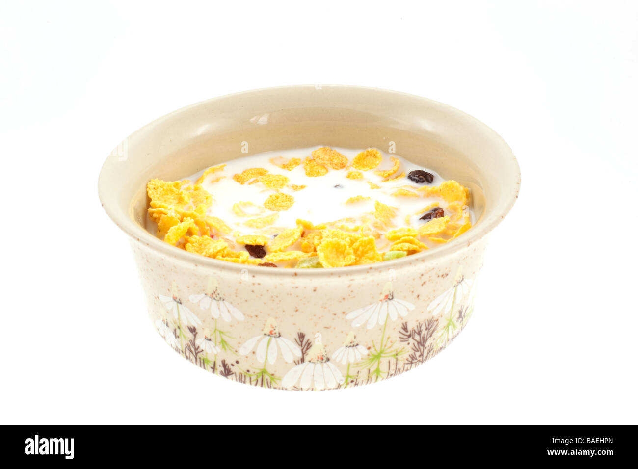 cornflakes with milk in a cup on a white background Stock Photo - Alamy