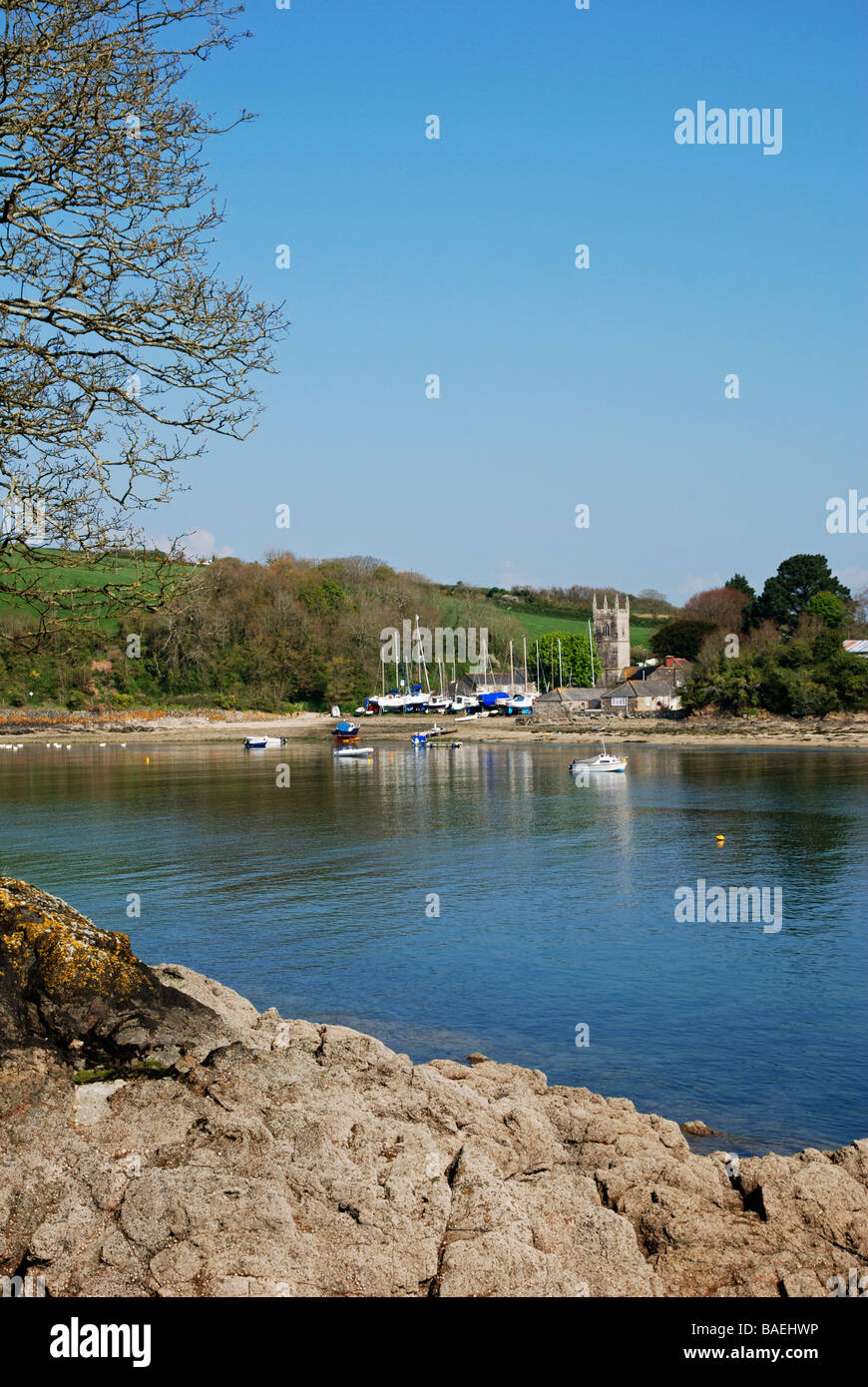 a view across gillan creek on the helford river, towards the church of ...
