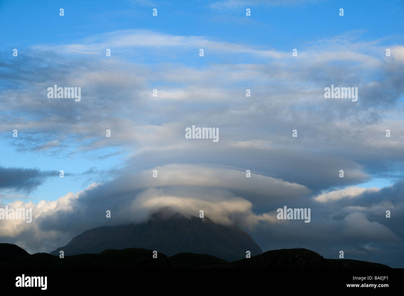 Lenticular cloud over mountains hi-res stock photography and images - Alamy