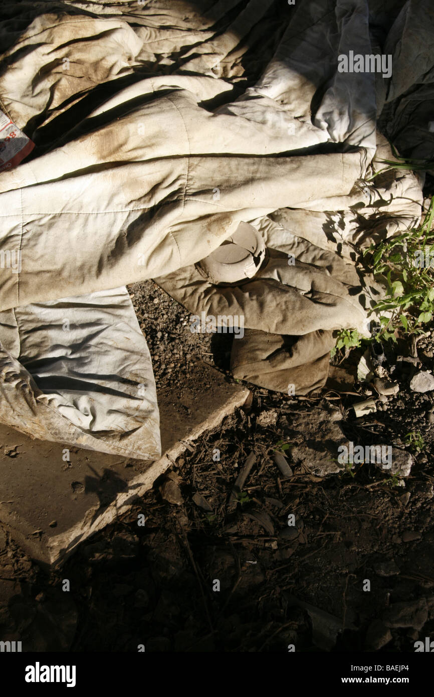bed of homeless man person under bridge Stock Photo - Alamy