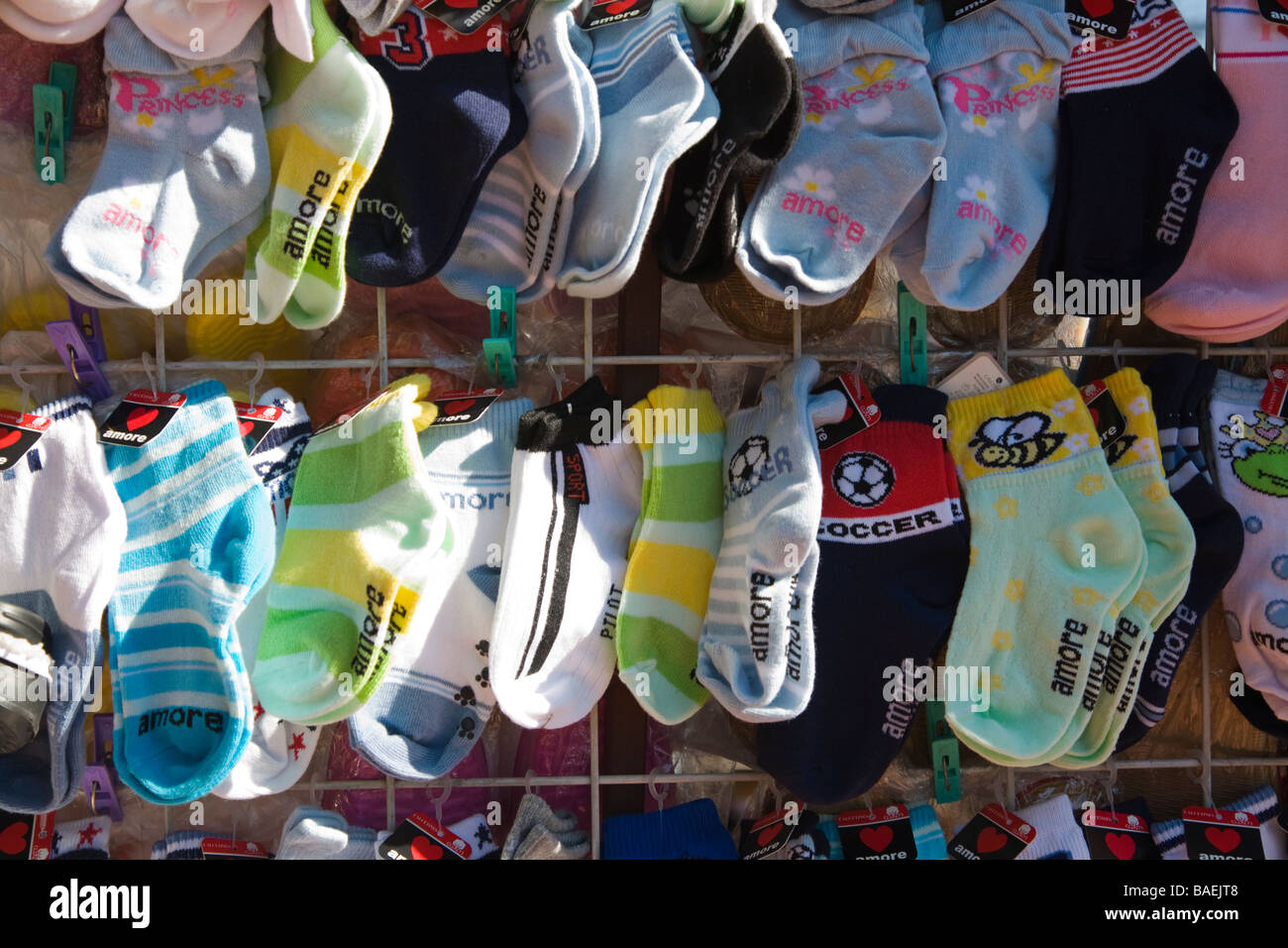 MEXICO La Paz Rows of childrens socks hanging on display at street ...