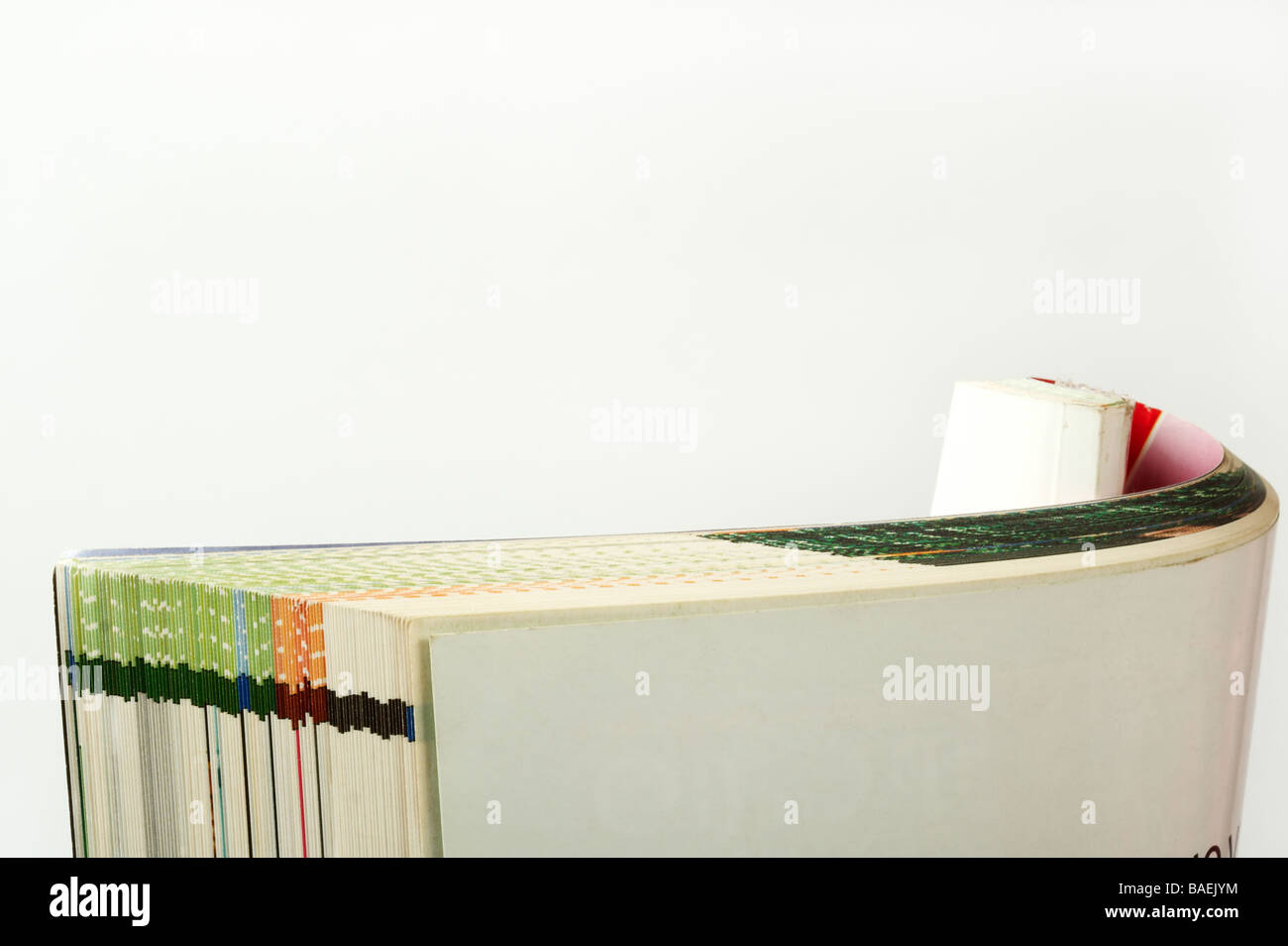 Color pages of old magazine on a white background Stock Photo - Alamy