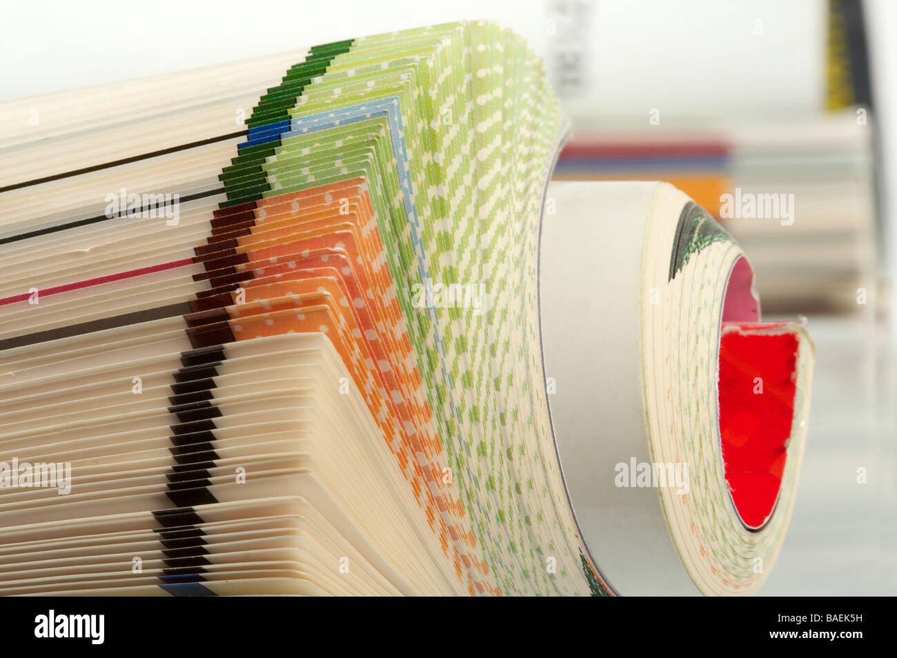 Color pages of old magazine on a white background Stock Photo - Alamy