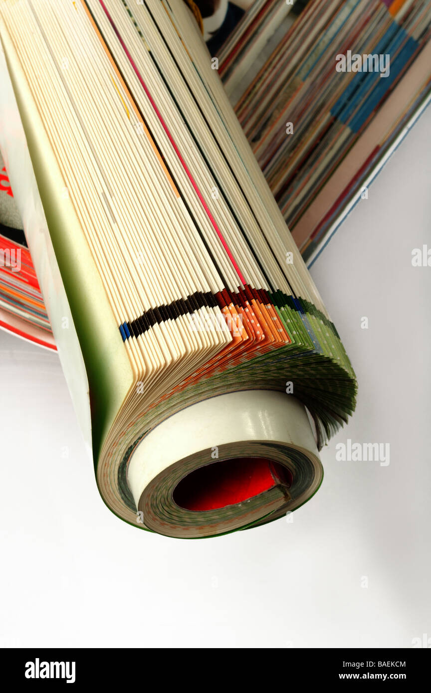 Color pages of old magazine on a white background Stock Photo - Alamy