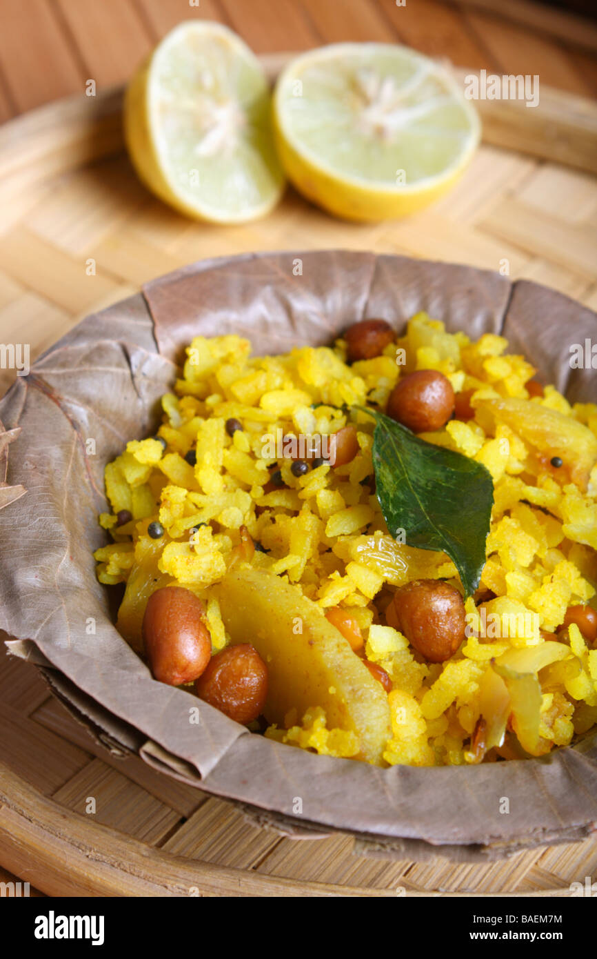 Poha is a snack made of from flattened or beaten rice and often eaten ...
