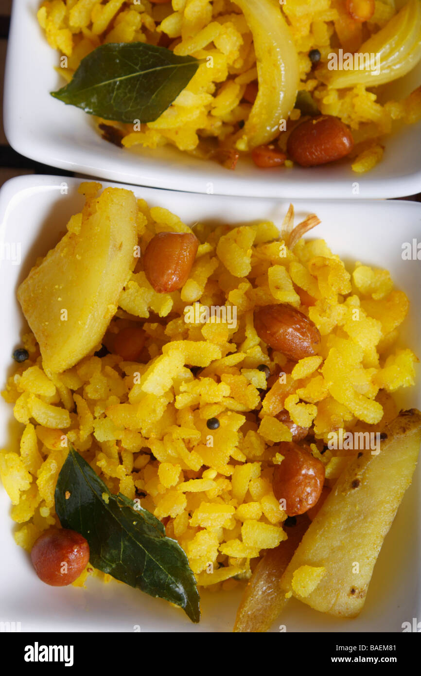 Poha is a snack made of from flattened or beaten rice and often eaten ...