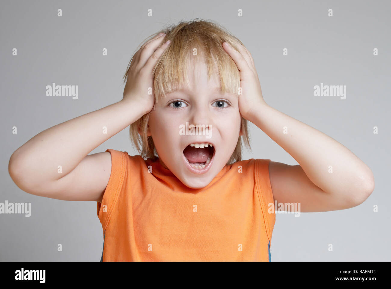 The shouting emotional boy Stock Photo - Alamy