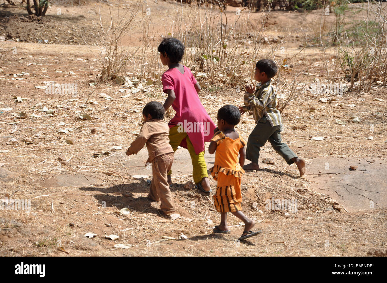 Tribal Children running in the Gujarat Desert Stock Photo - Alamy