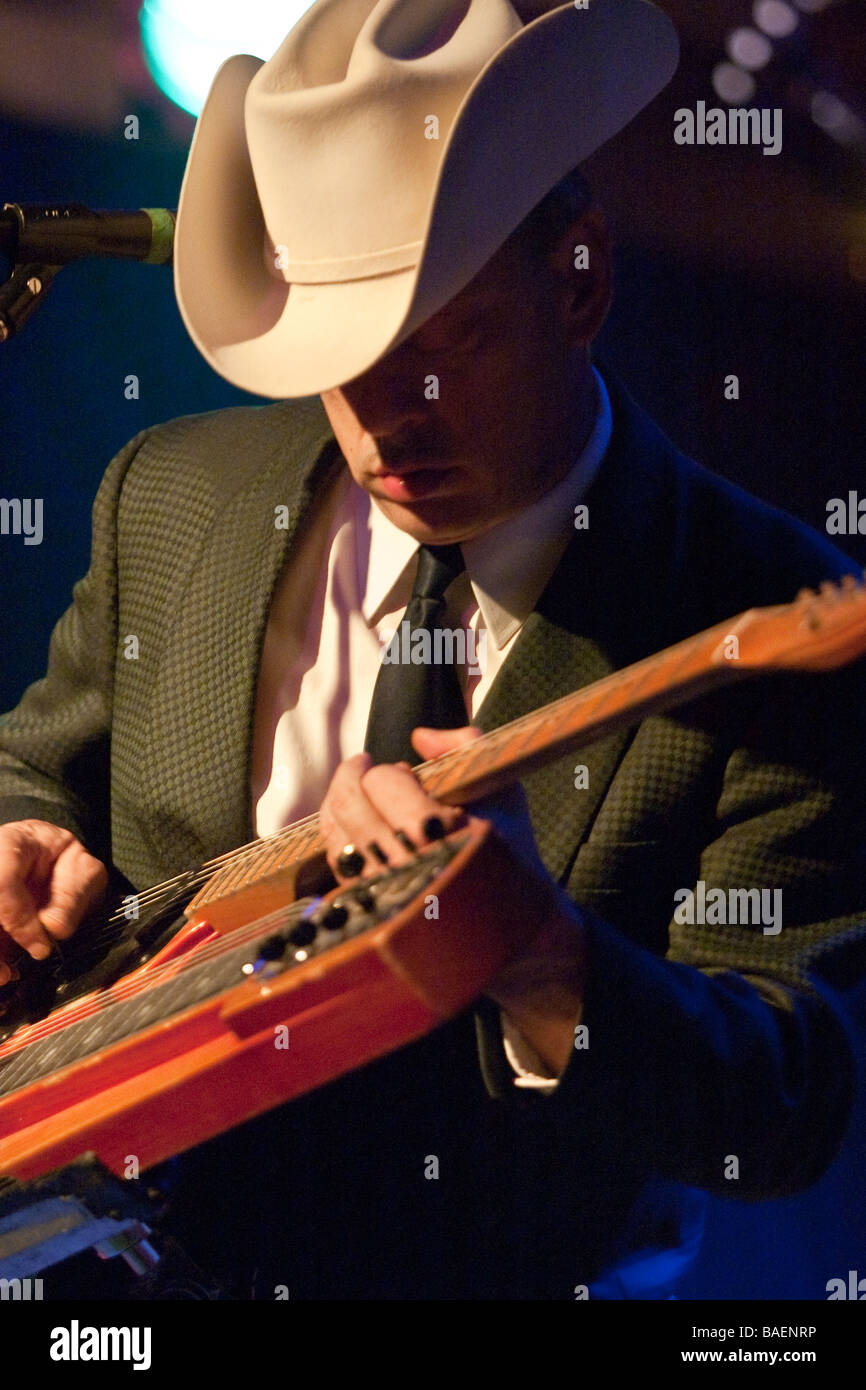 Junior Brown, a popular country music musician, is a guit steel guitar ...
