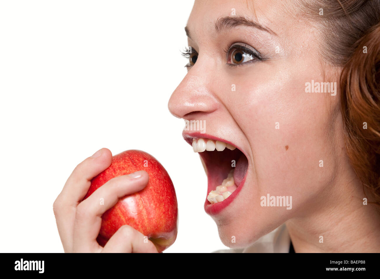 Eating an apple Stock Photo - Alamy