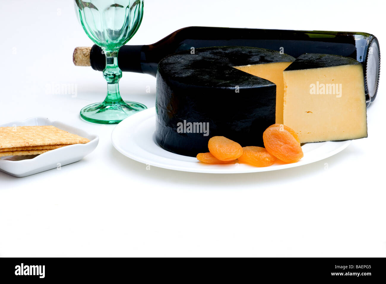 Parmesan cheese platter and wine Stock Photo - Alamy