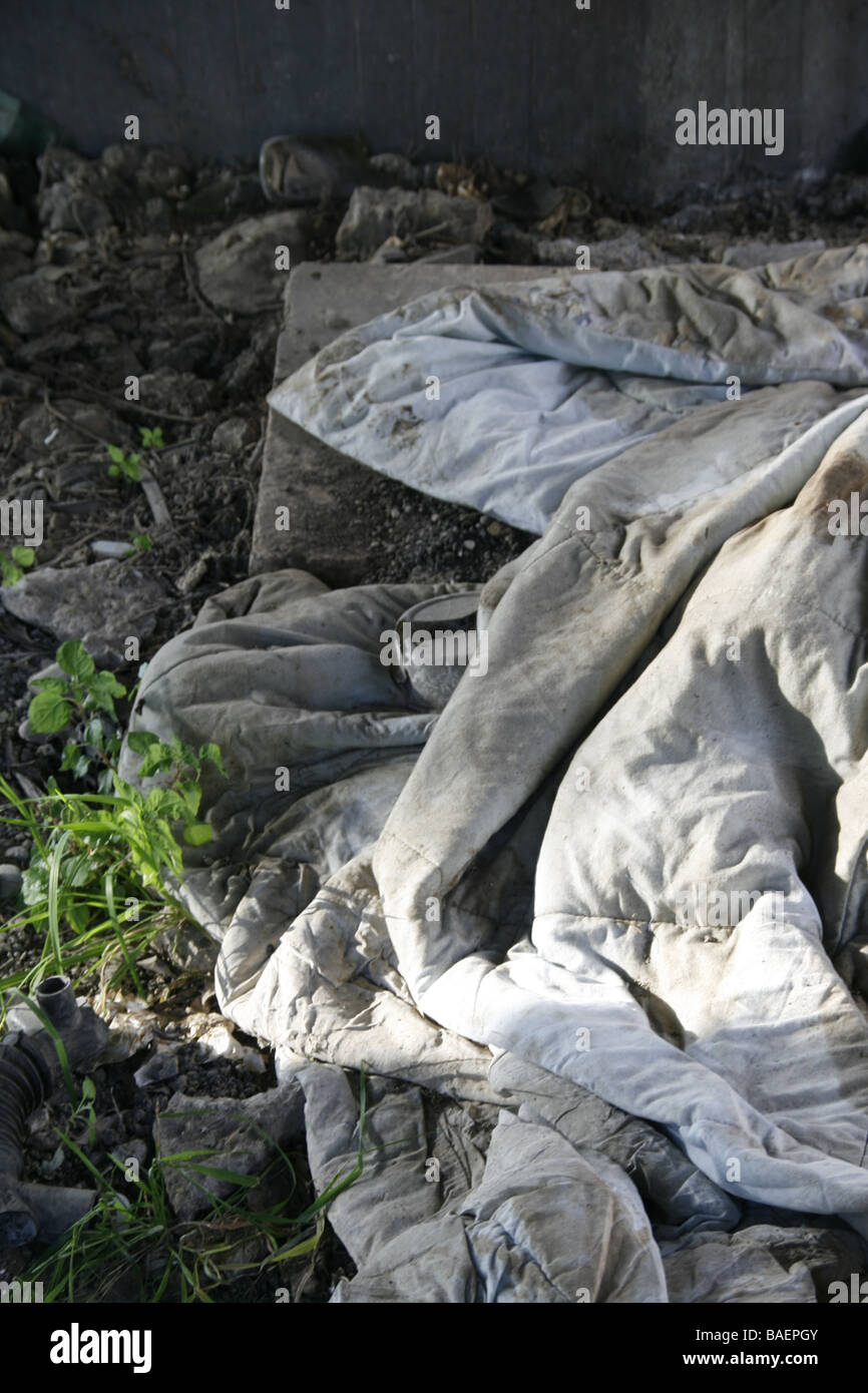 bed of homeless man person under bridge Stock Photo - Alamy