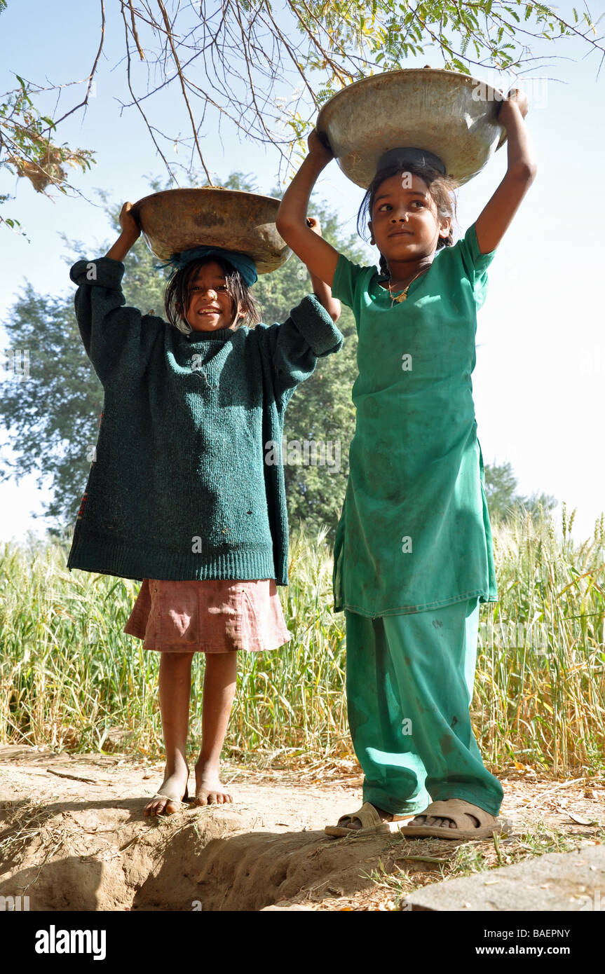 Tribal Children doing hard manual work near the Poshina Shrine, Gujarat ...