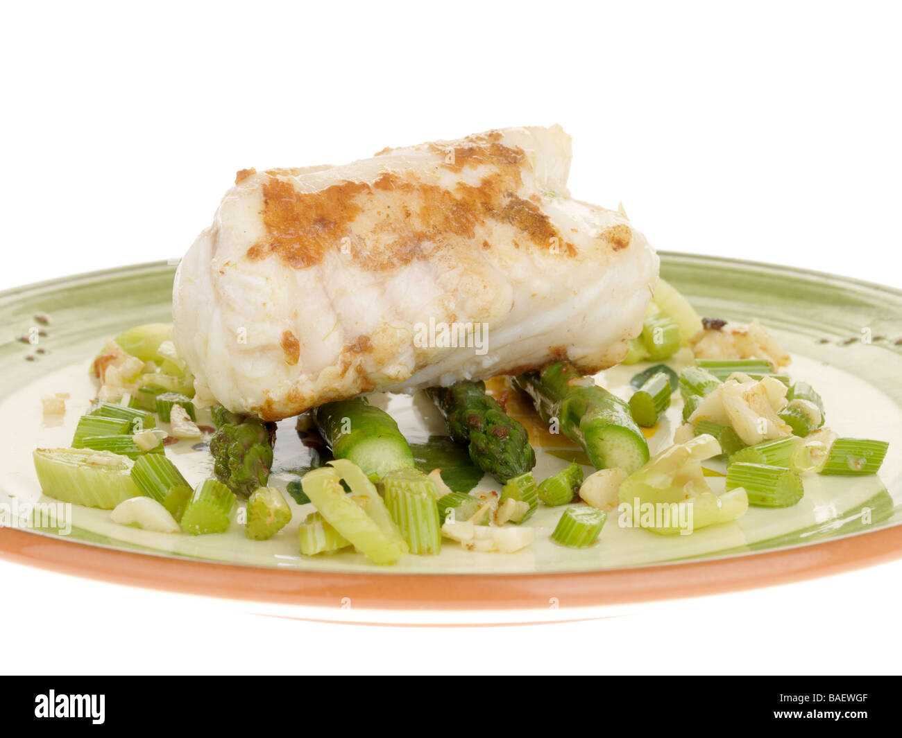 Freshly Cooked Healthy Monk Fish With Asparagus Isolated Against A ...