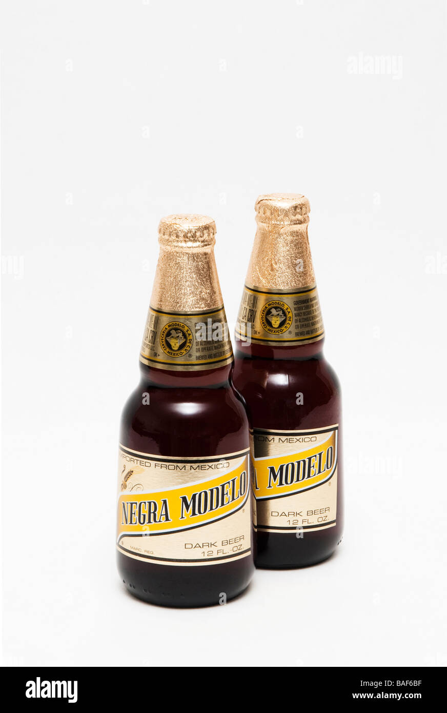 two bottles of Negra Modelo beer on a white background Stock Photo - Alamy