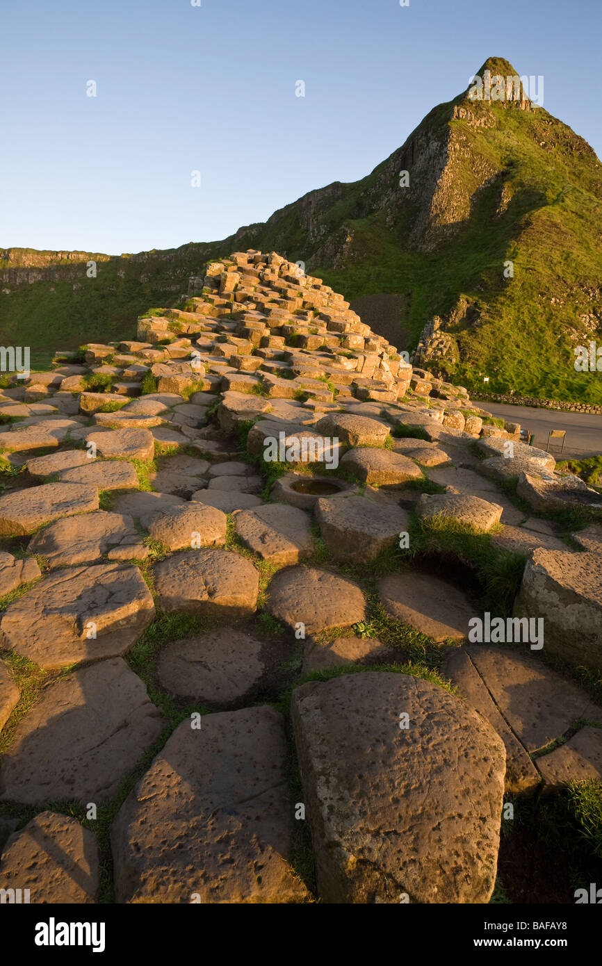 Causeway Pinnacle. The hexagonal columns of the Causeway lit by a ...