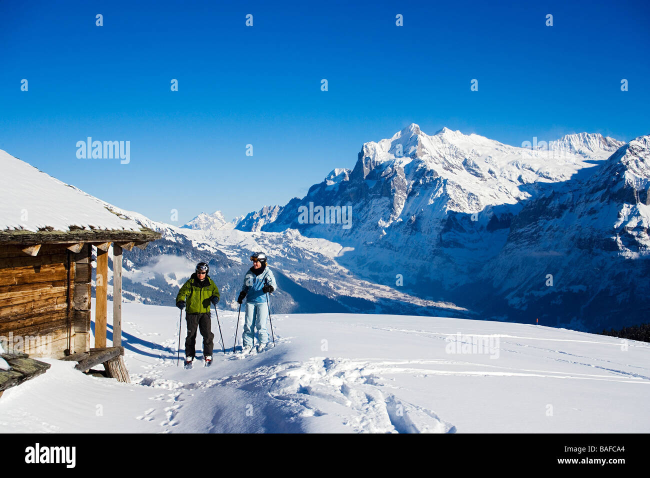 Back country skiers near an alpine hut Maennlichen Grindelwald Bernese ...