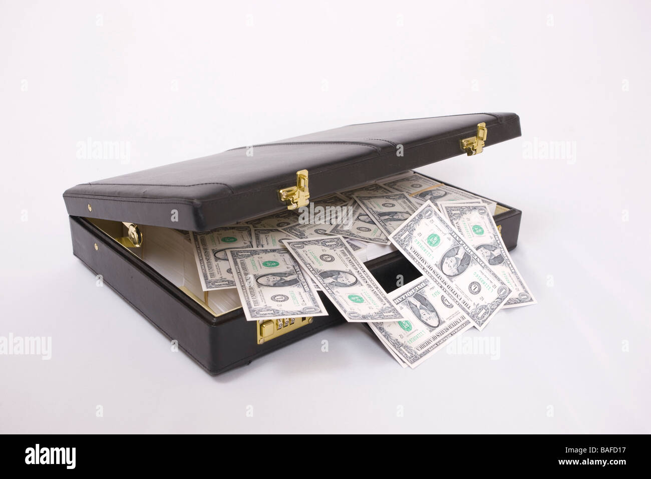 Briefcases money hi-res stock photography and images - Alamy