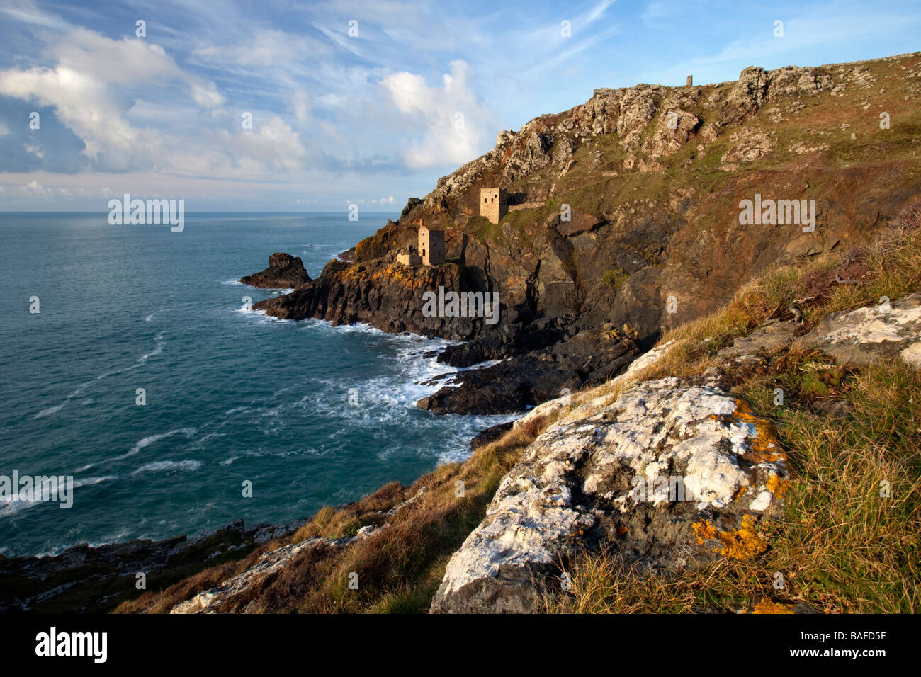 Sun setting over Botallack tin mines, Cornwall, England, UK Stock Photo ...