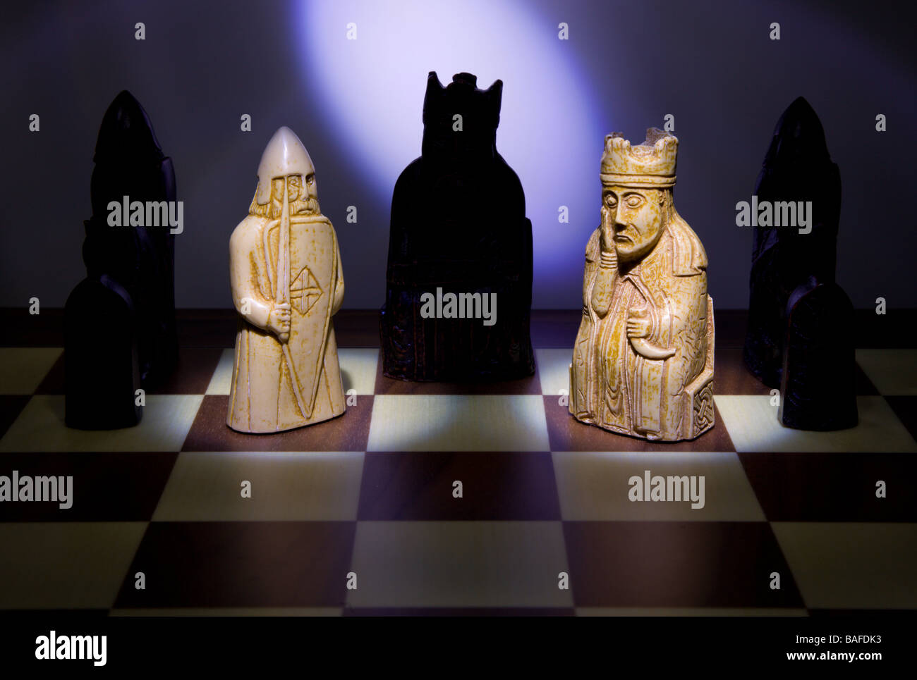 A Queen and Bishop holding a King in Check Stock Photo - Alamy