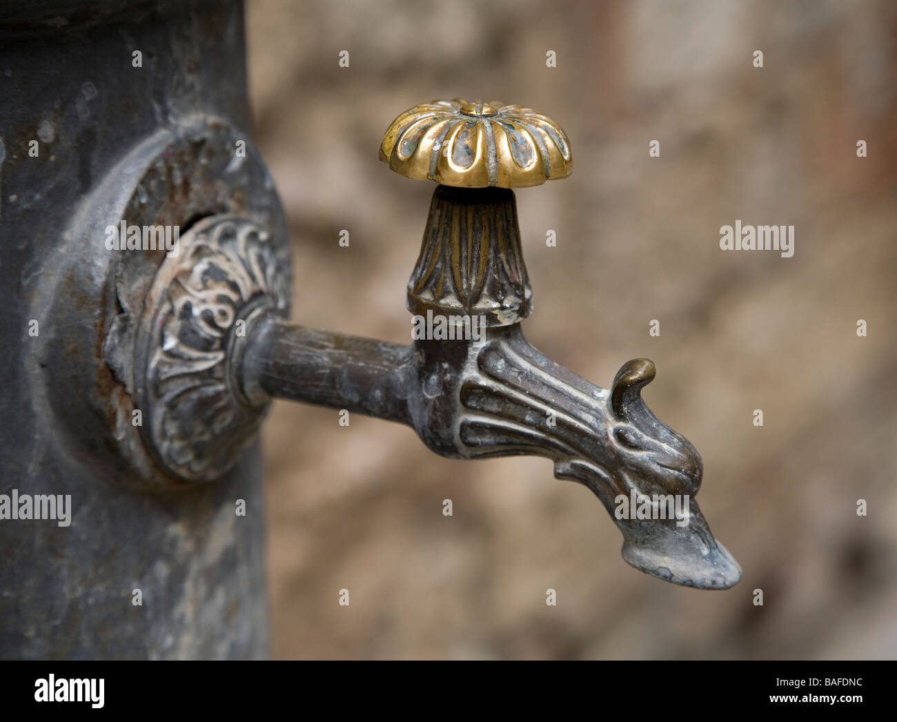 Detail of an old fashioned public water tap in Sarteano Tuscany Stock ...