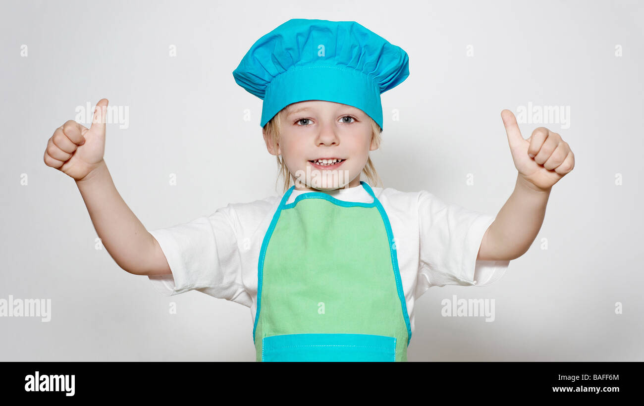 Portrait of the little cook Stock Photo - Alamy