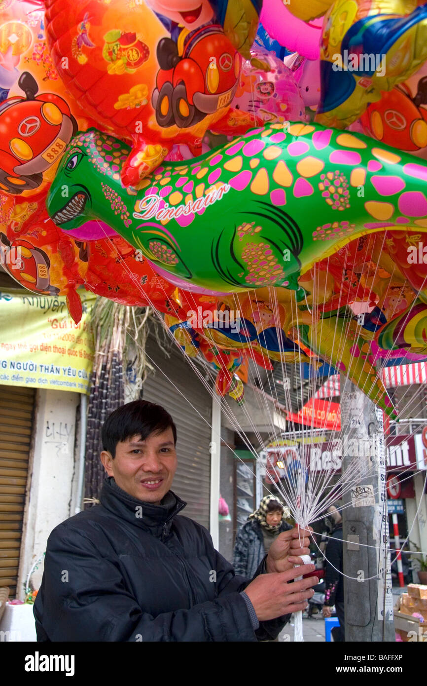 Street vendor selling colorful balloons for Tet in Hanoi Vietnam Stock ...