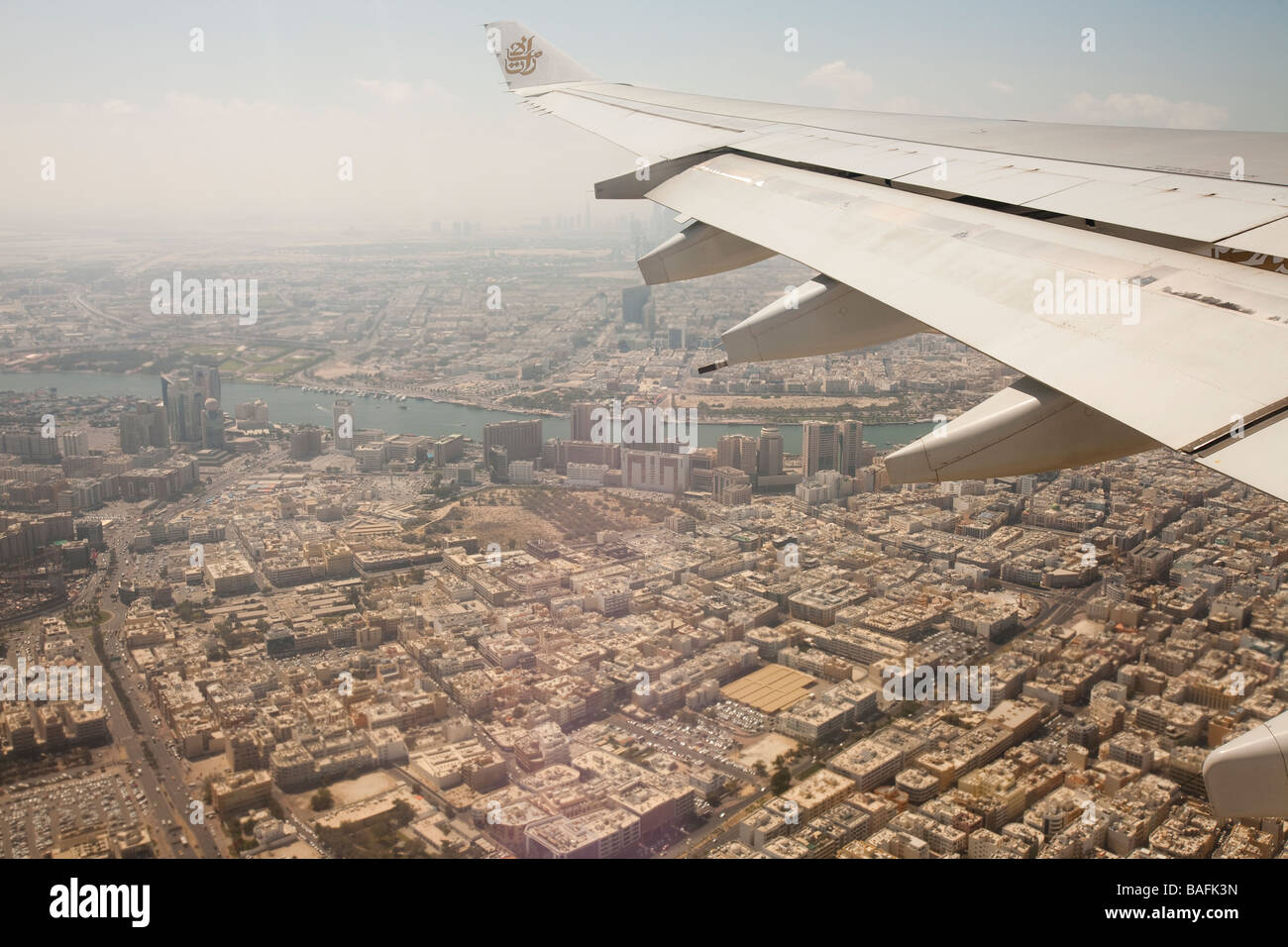 A plane flying over Dubai in the UAE Stock Photo - Alamy