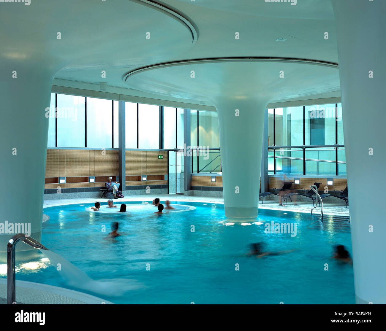 thema bath spa interior view-overall shot on lower pool with people ...