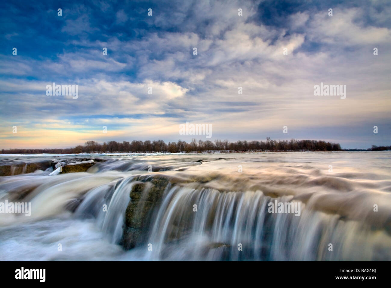 A Quebec, Canada landscape of a beautiful waterfall at the end of ...