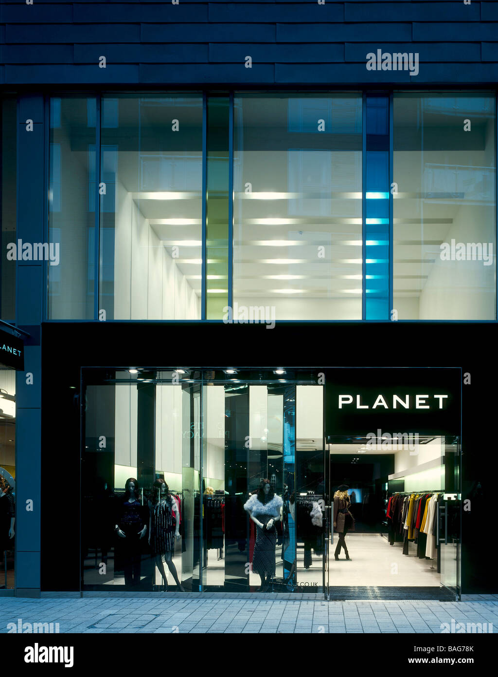 planet shop front of store at night Stock Photo - Alamy