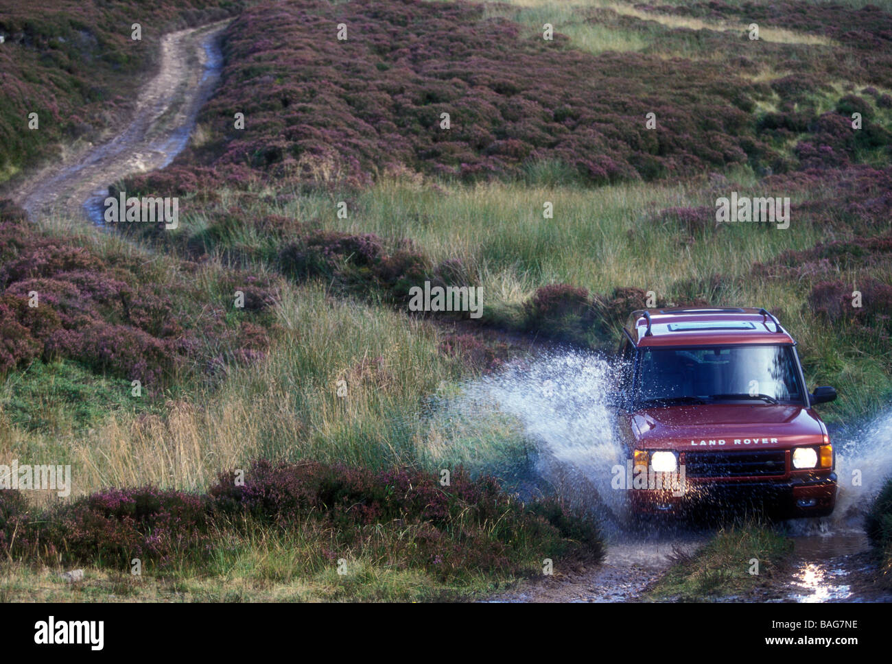 4x4 off road vehicle fording a stream in the Scottish highlands Stock ...