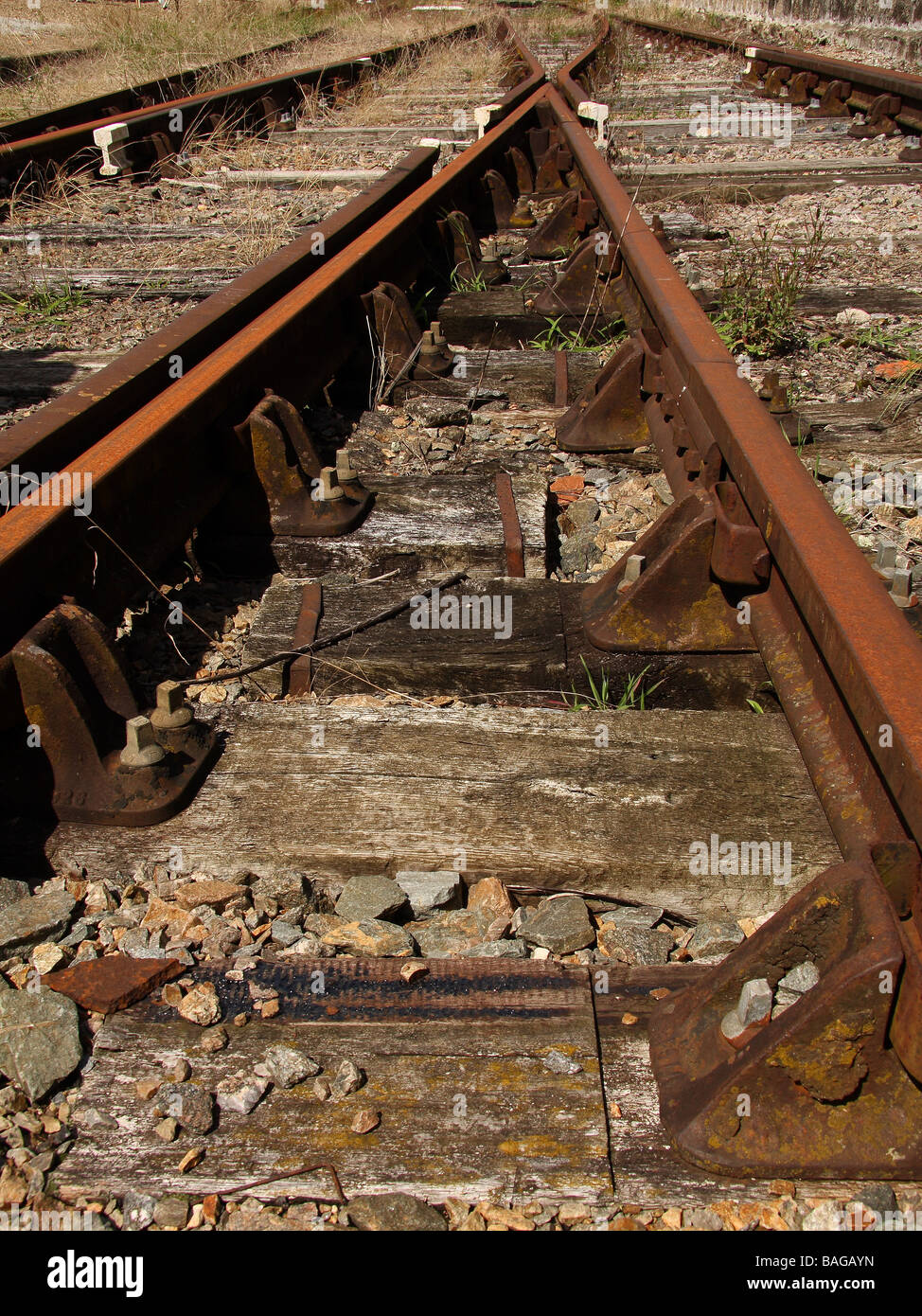 Old rusty railway tracks crossing over Limousin France Stock Photo - Alamy