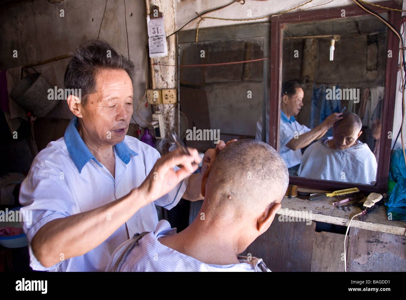 Scene in a Barber shop in the ancient village of Langzhong, Sichuan ...