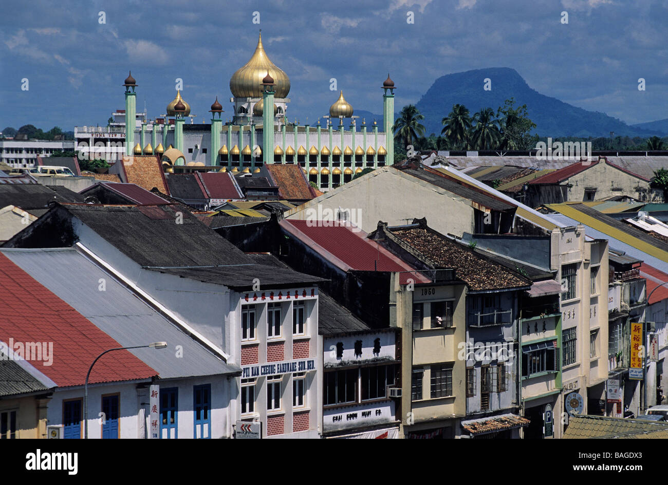 Malaysia, Borneo, Sarawak province, Kuching, houses and mosque Stock ...