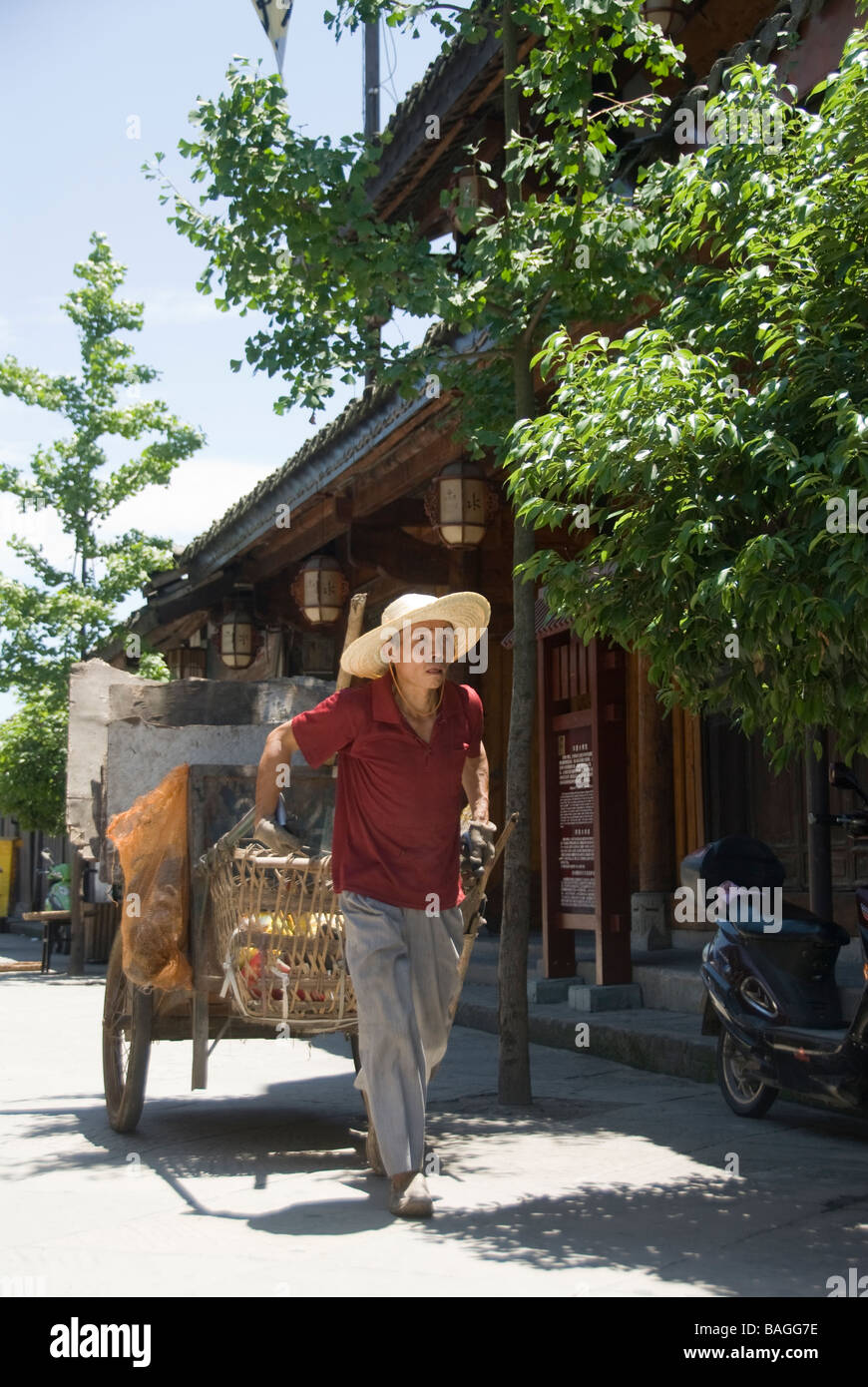 Garbage collector in the town of Langzhong Sichuan Province China Stock ...