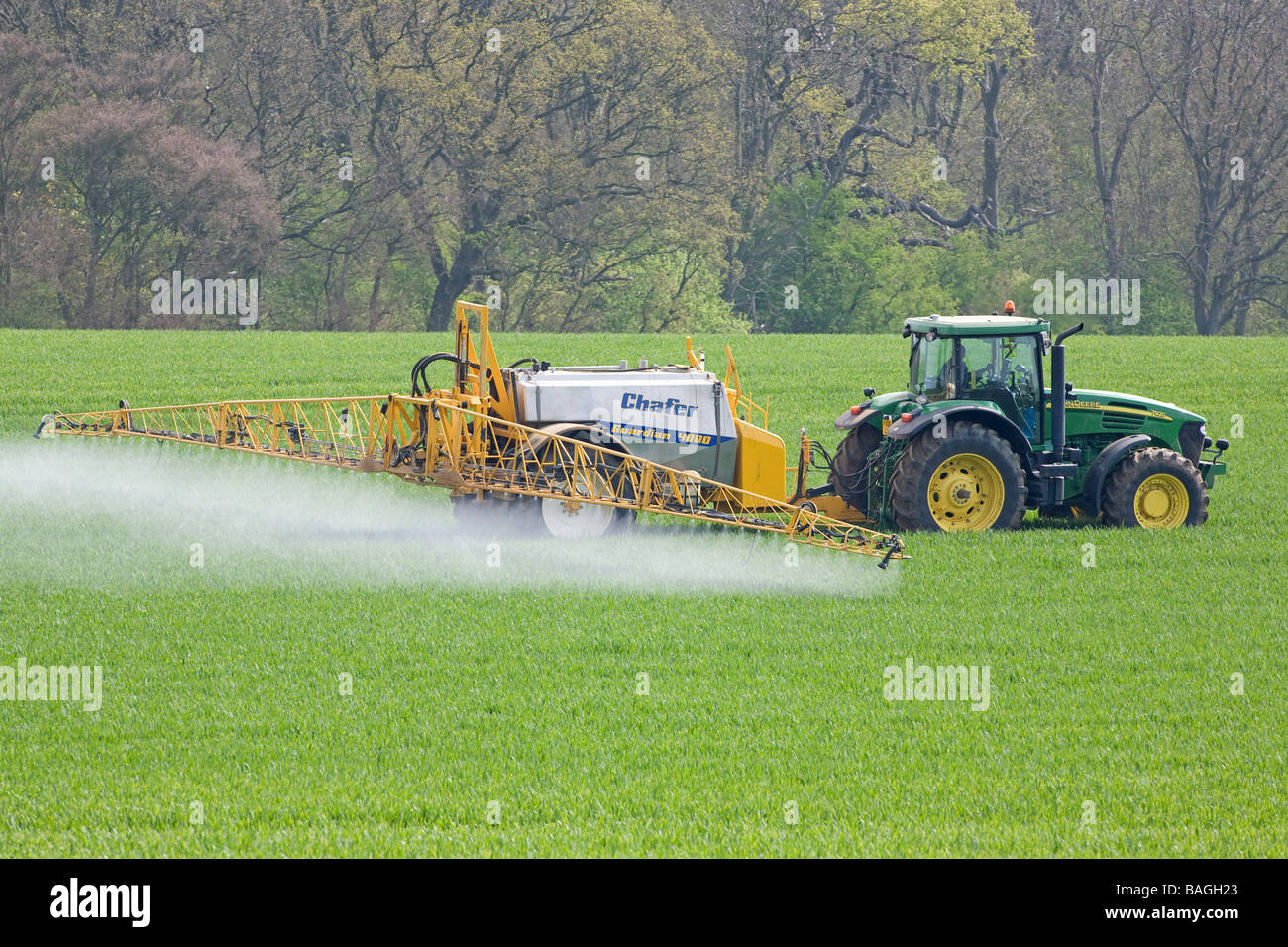 Tractor crop spraying wheat hi-res stock photography and images - Alamy